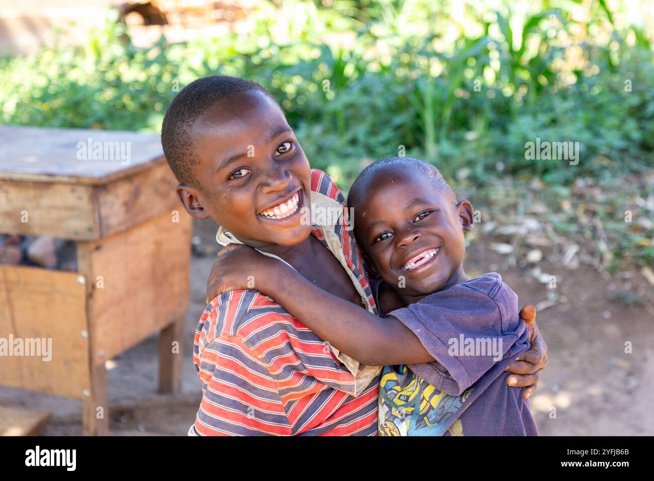 Two little boys. Ugandan countryside Stock Photo - Alamy