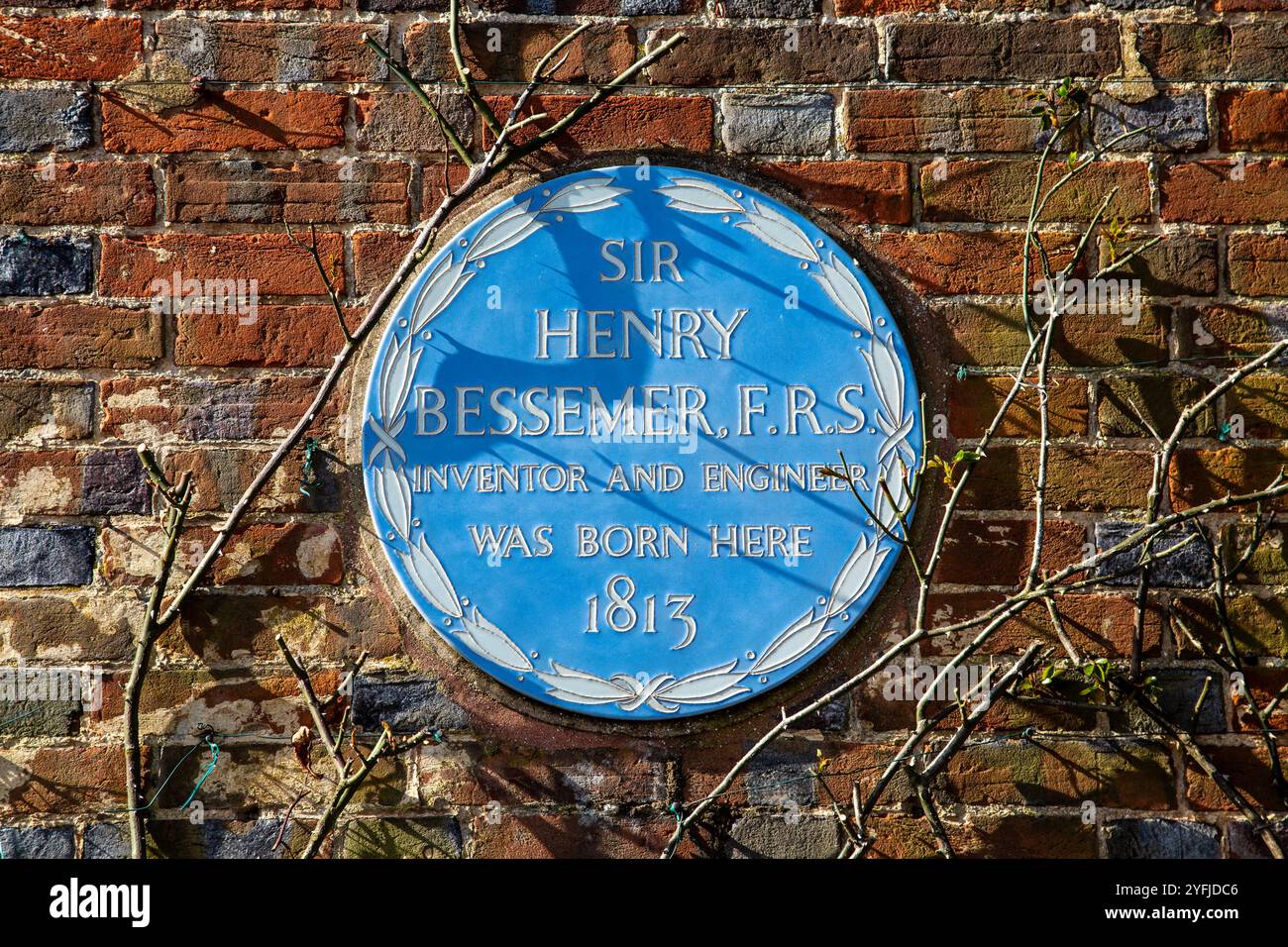 Blue heritage plaque at the birthplace home of Sir Henry Bessemer ...
