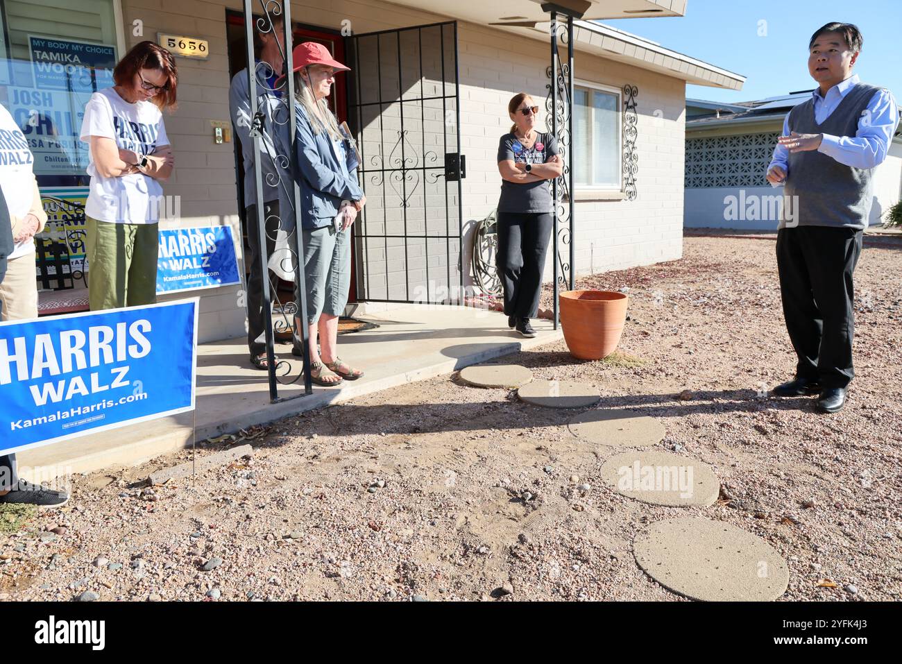 California Congressman Ted Lieu stops by a private home to speak to a ...