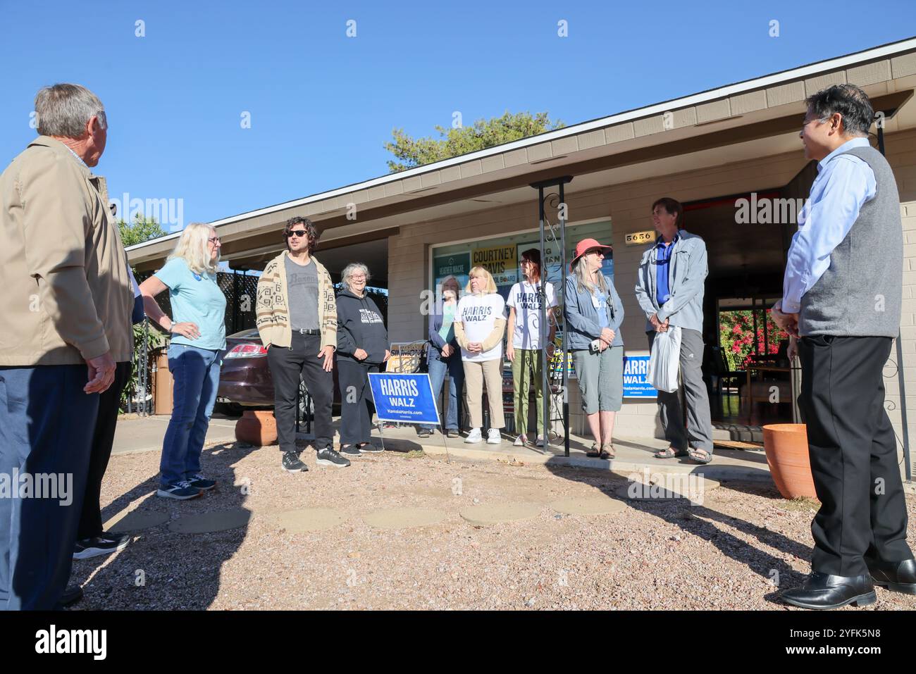 California Congressman Ted Lieu stops by a private home to speak to a ...