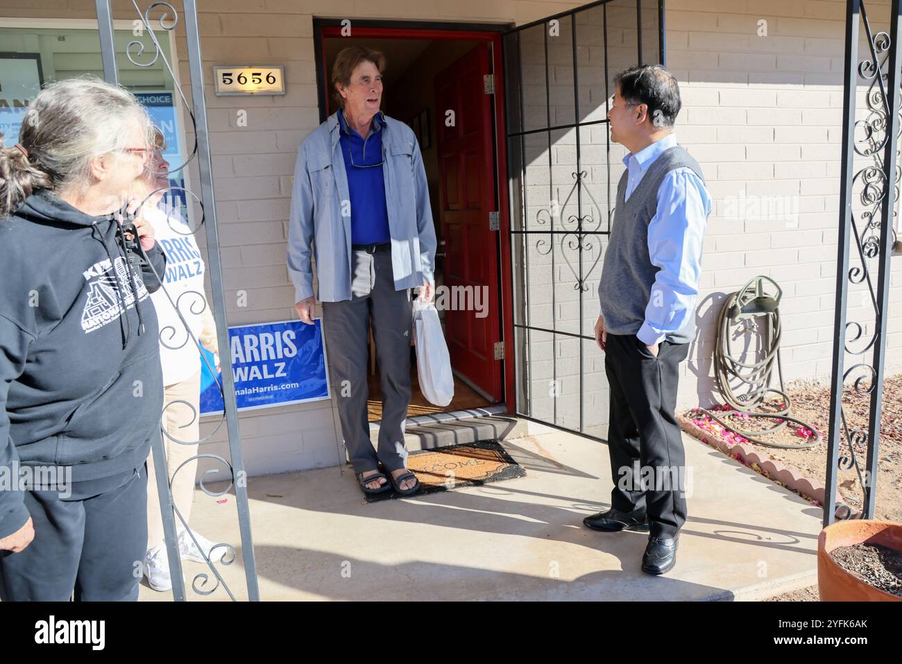 California Congressman Ted Lieu stops by a private home to speak to a ...