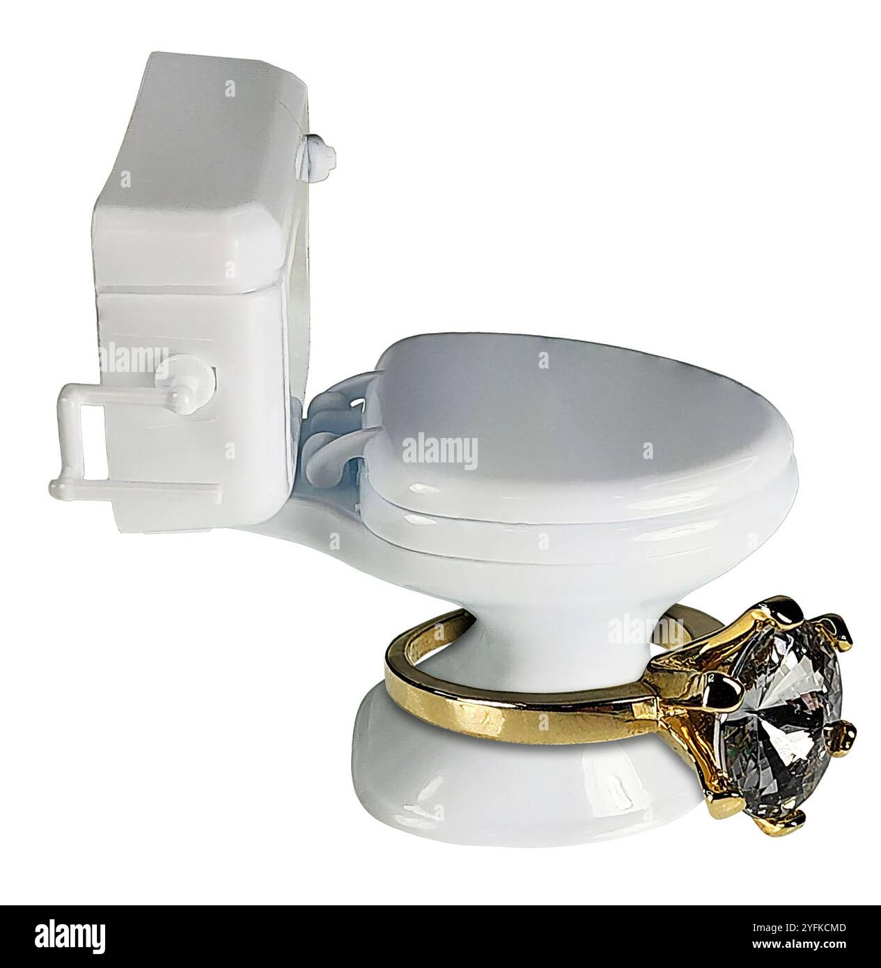 Plain white toilet viewed from the side with diamond ring to show ...