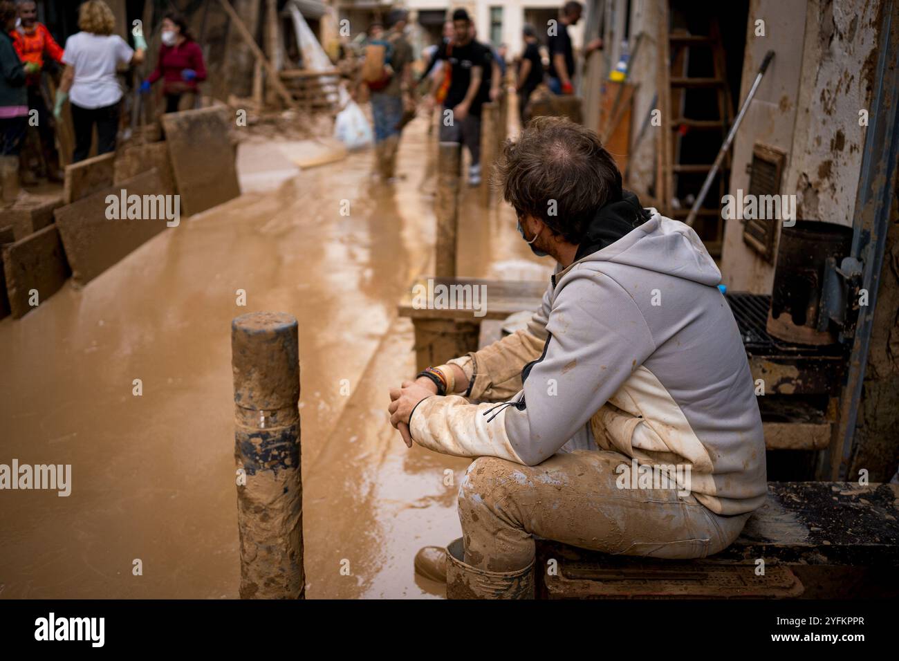 Paiporta, Spain. 03rd Nov, 2024. A man is seen resting during the ...