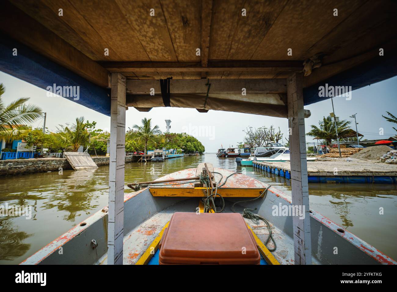 River Estuary View from Inside a Traditional Fisherman's Boat. A Murky ...