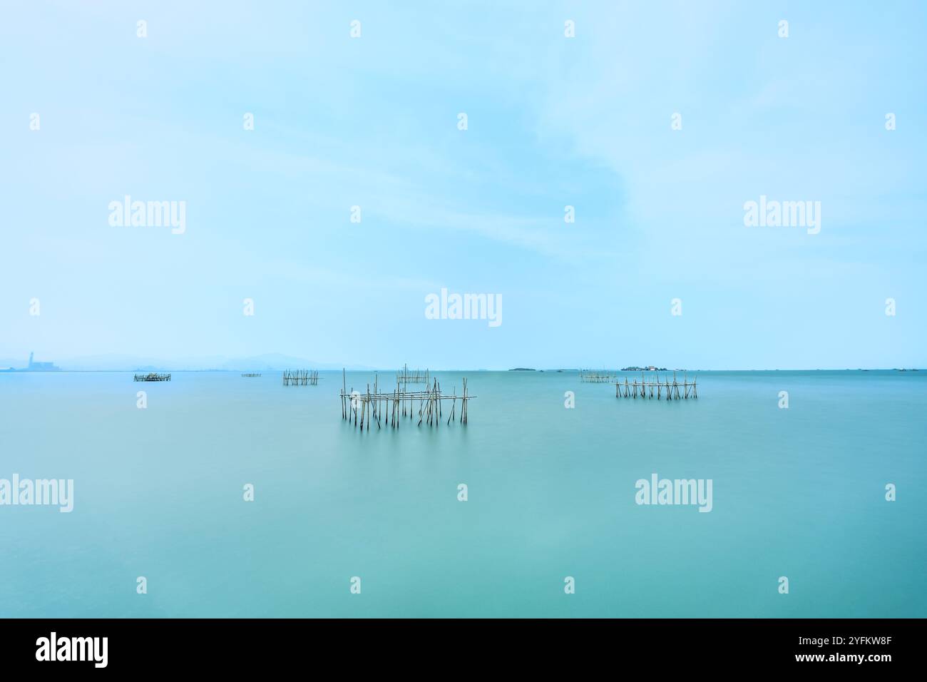 Tranquil Ocean with Fisherman’s Bamboo Platform. Vast Azure Ocean Under ...