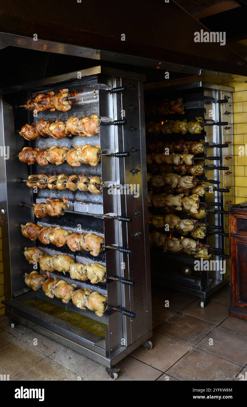 Roasted chickens at L'Oca restaurant in Sitges, Catalonia, Spain Stock ...