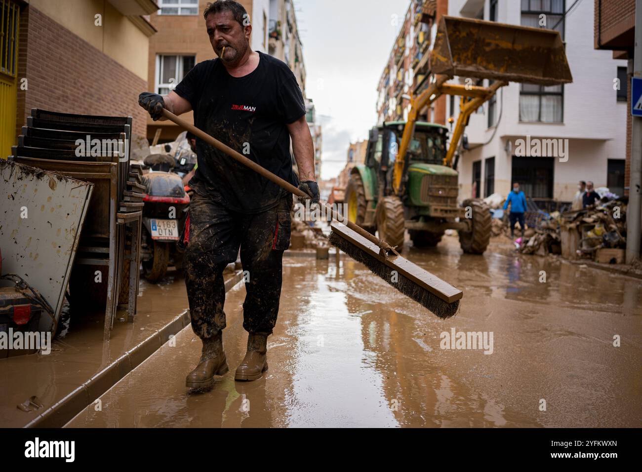 Paiporta, Spain - 03 November 2024: Locals and volunteers are seen ...