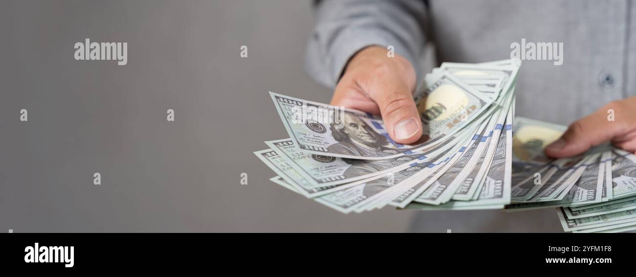 100 dollar bills falling hi-res stock photography and images - Alamy