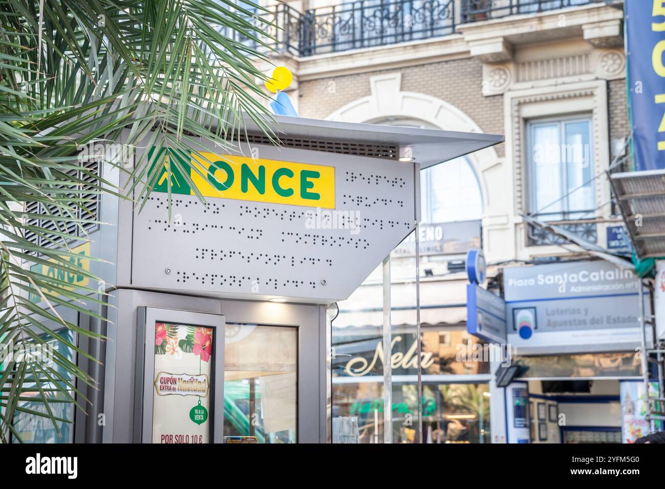 VALENCIA, SPAIN - OCTOBER 13, 2024: An ONCE sign on kiosk in Valencia ...