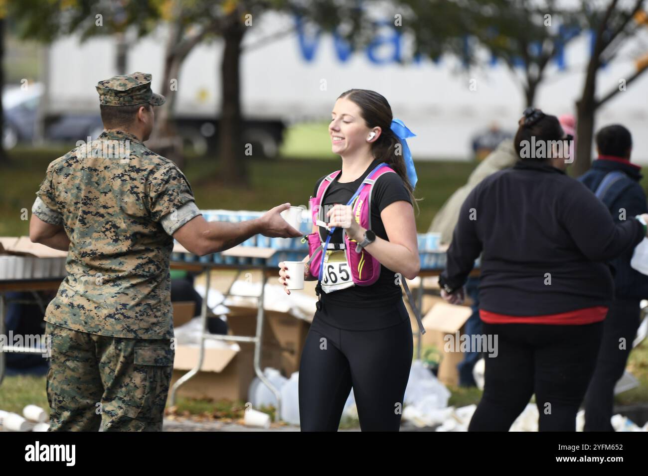 Athlete people handing out water hi-res stock photography and images ...