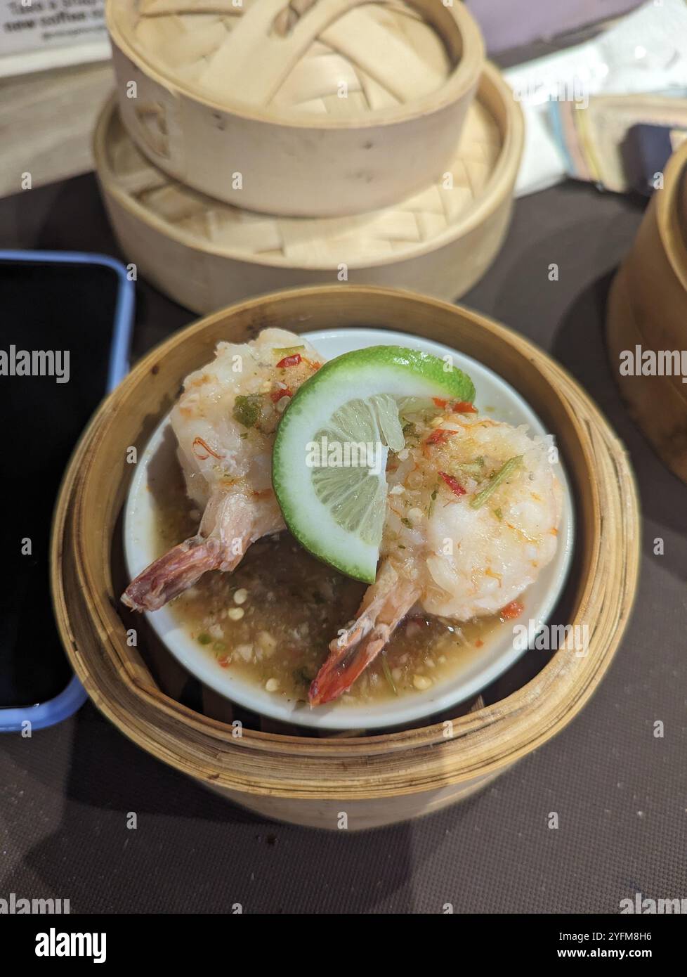 Two prawns with lemon wedge hi-res stock photography and images - Alamy