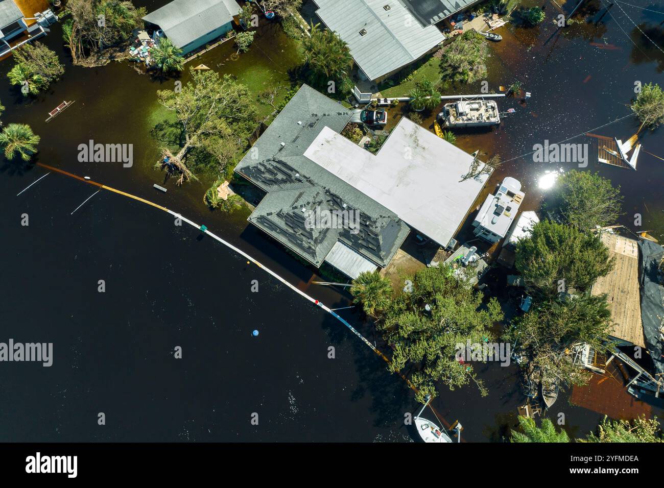 Aftermath of natural disaster. Surrounded by hurricane Ian rainfall ...