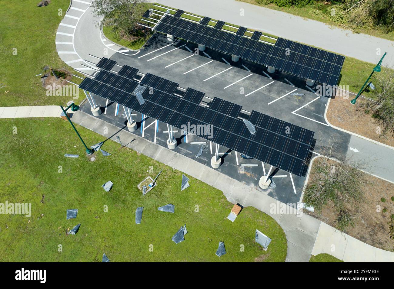 Destroyed by hurricane wind solar panels installed over parking lot ...