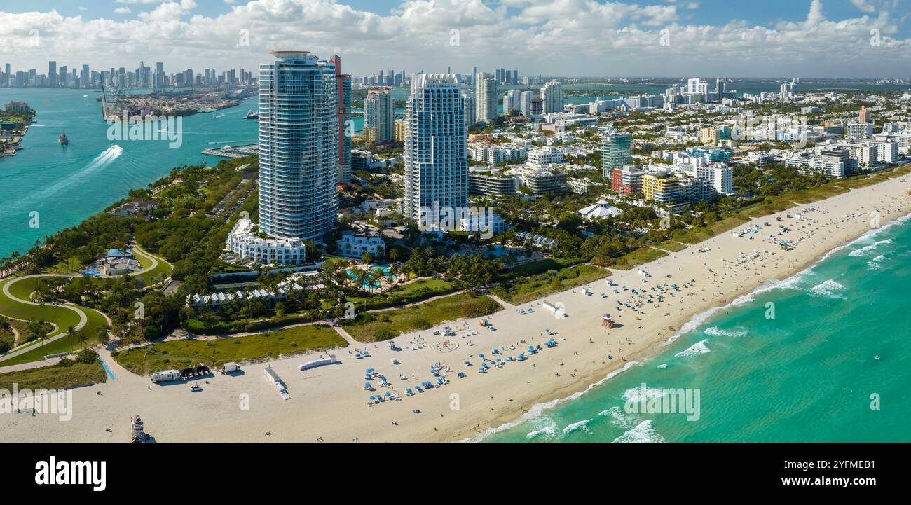 Aerial view of South Beach sandy surface with tourists relaxing on hot ...
