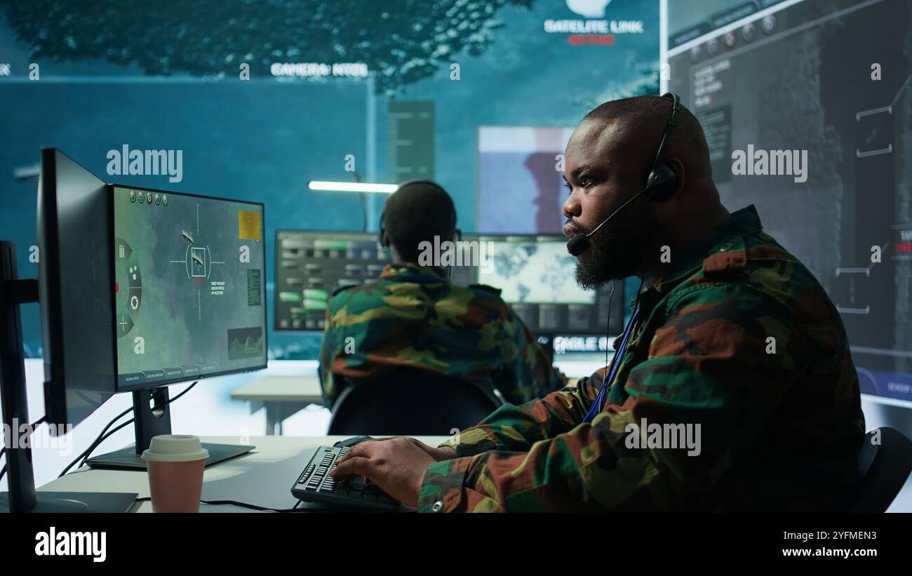 Government intelligence officers in control room manage surveillance ...