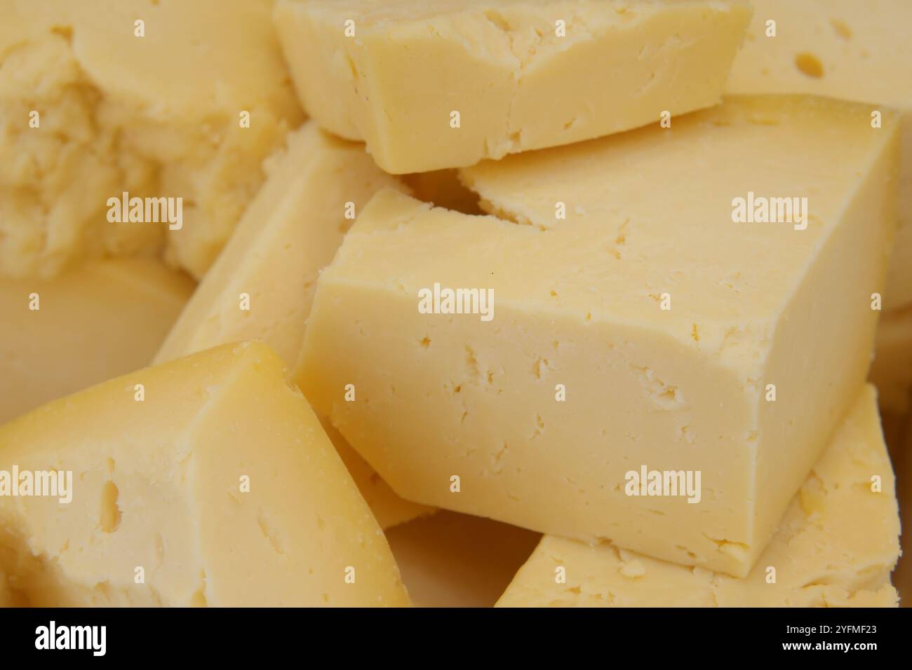 Indulge in the delightful experience of Freshly Cut Yellow Cheese ...