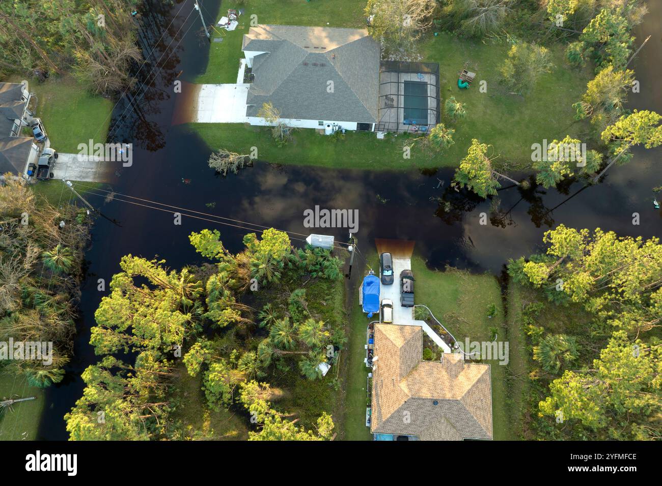 Aftermath of natural disaster. Surrounded by hurricane rainfall flood ...