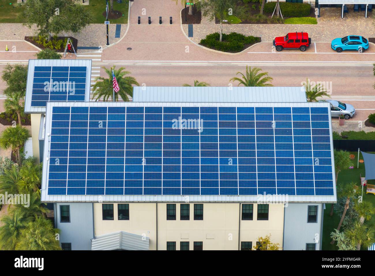 Florida office building with solar roof. Blue photovoltaic panels for ...