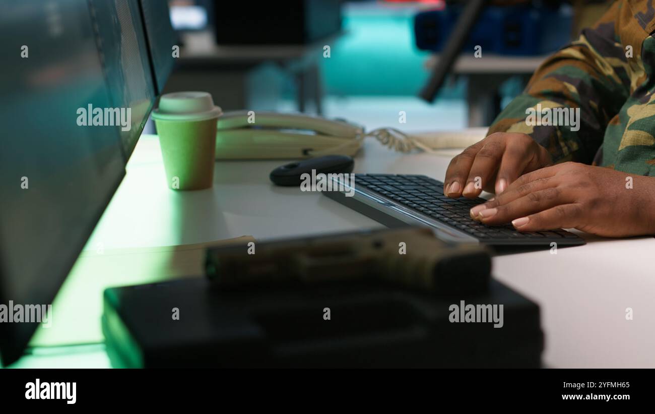 Military officer making telephone call to relay enemy info gained using tracking equipment. Army ...