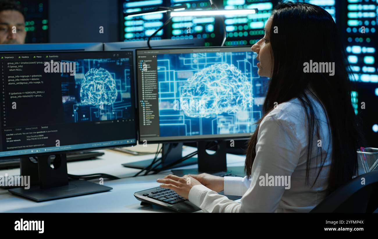 Technicians coworkers using AI tech on computer to do checkup in server room. Teamworking ...