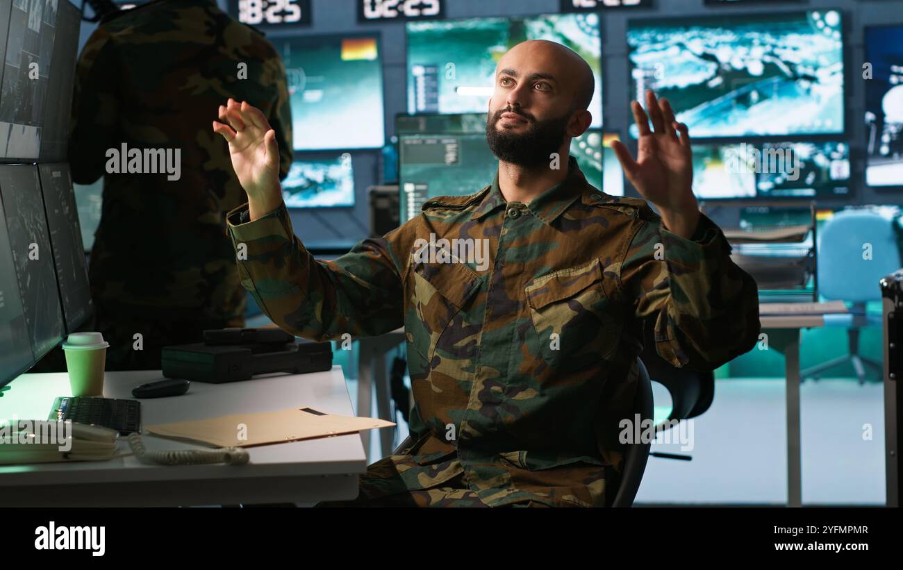 Military agent using augmented reality tech in control room, analyzing ...