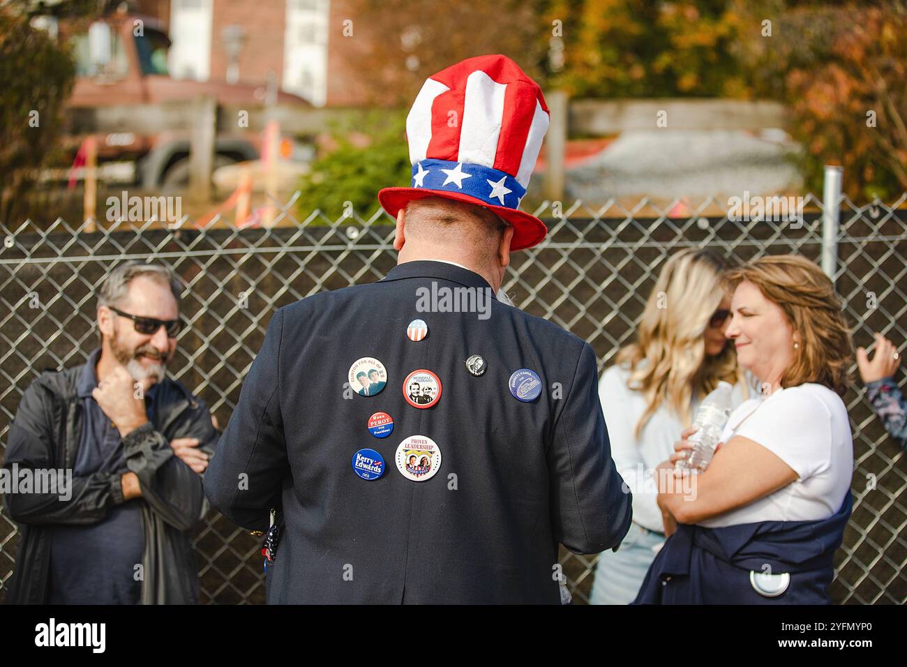 A political activist wearing a hat with the colors of the American flag ...