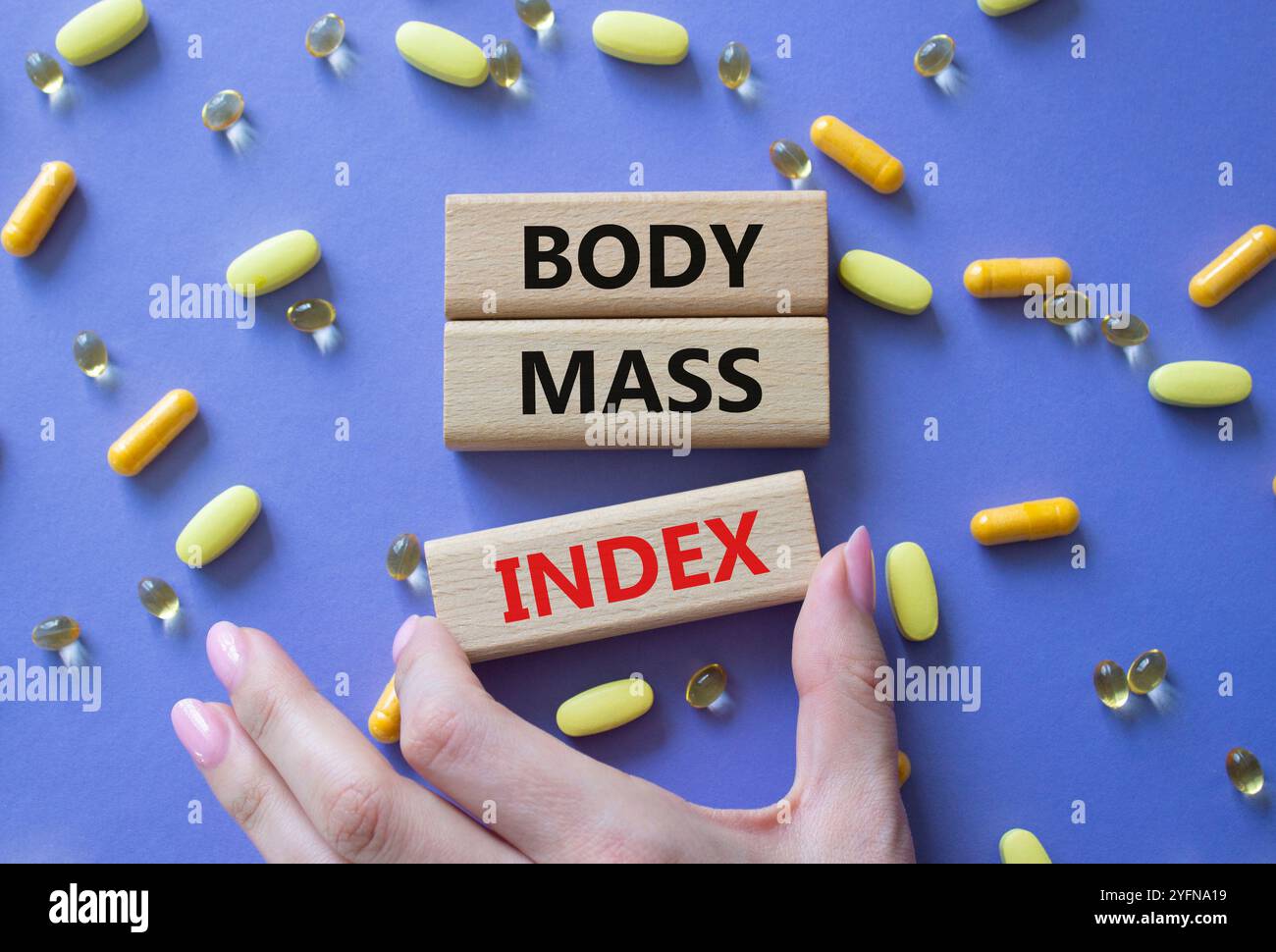 Body Mass Index symbol. Concept word Body Mass Index on wooden blocks ...