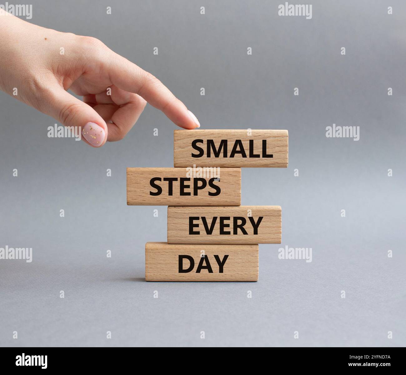 Small Steps Every Day symbol. Wooden blocks with words Small Steps ...