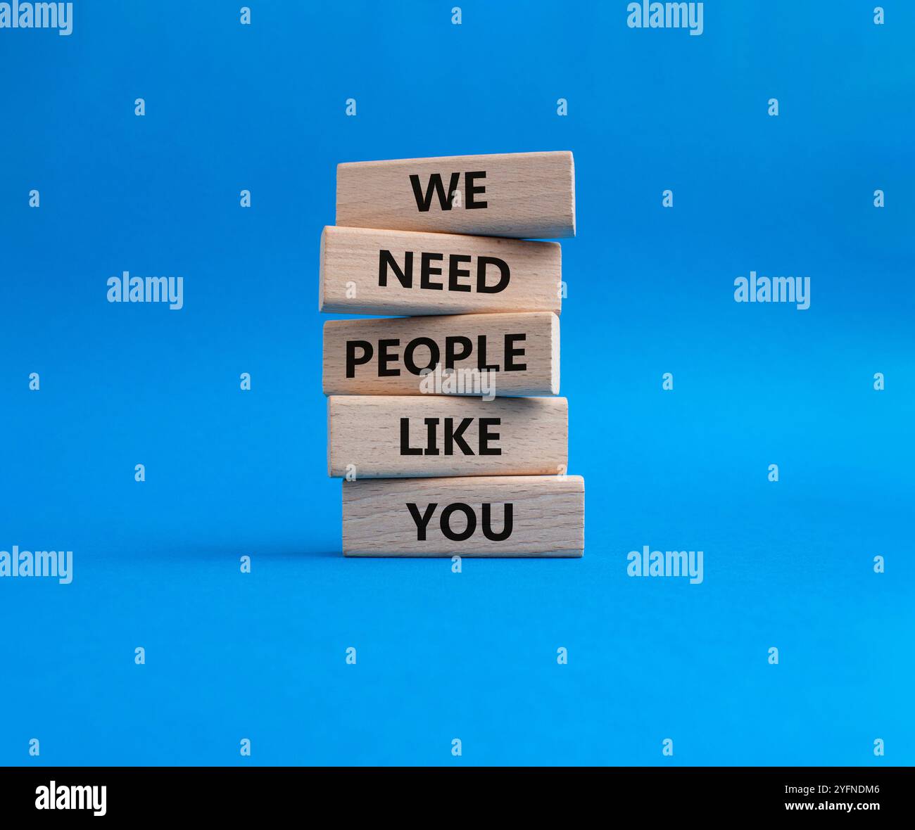 Hiring symbol. Wooden blocks with words We need People like You ...