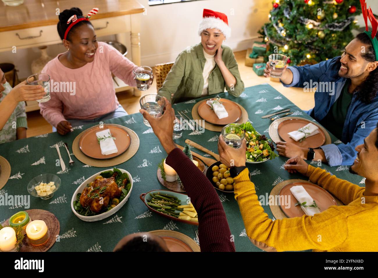 Happiness family friends celebrating raising hi-res stock photography and images - Alamy