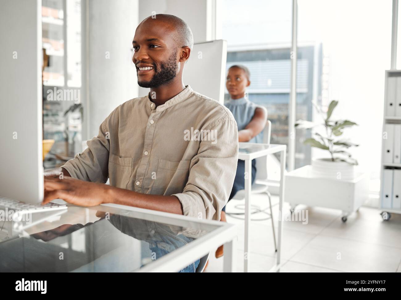 Office, happy and man with computer at desk for information technology ...