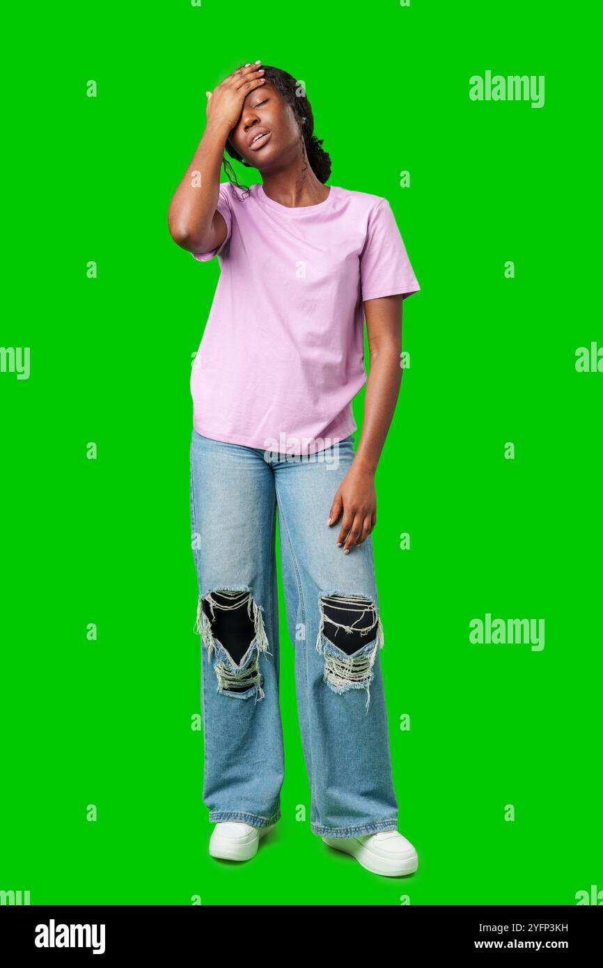 A woman expressing frustration while standing in front of a bright ...