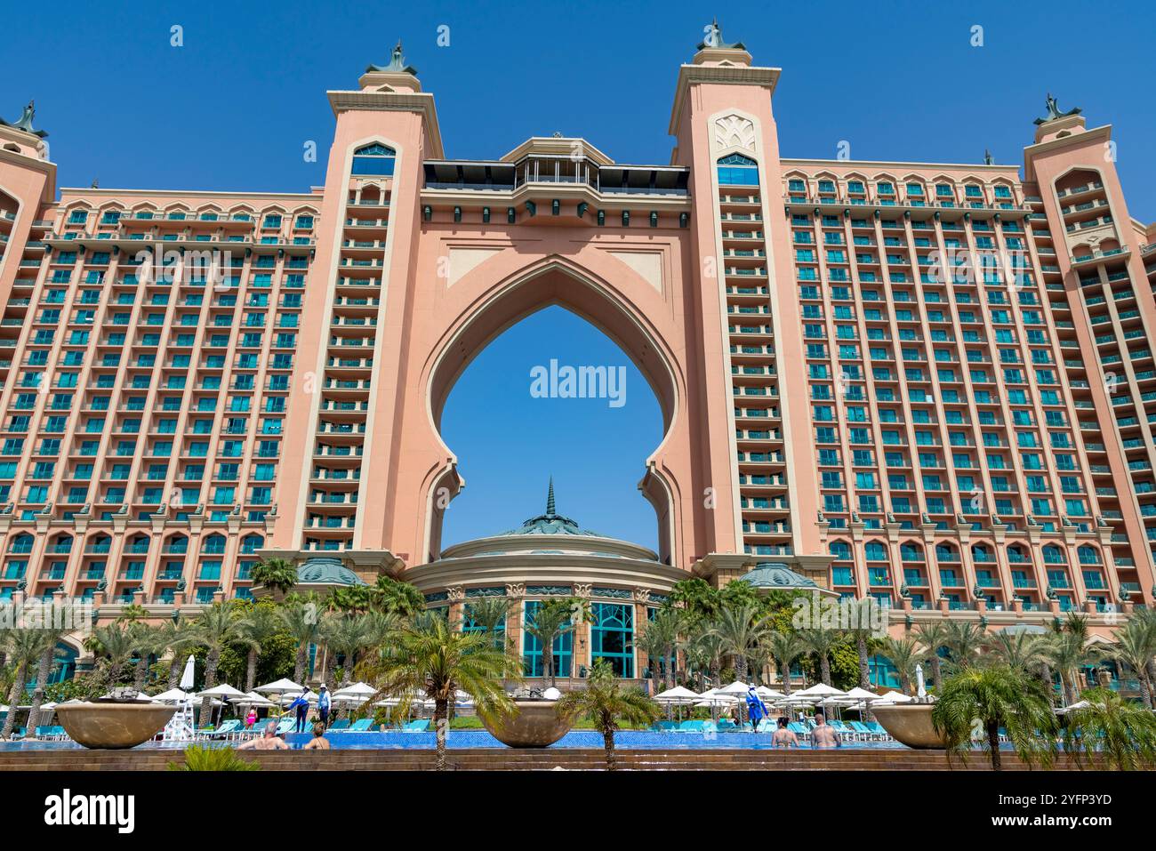 Hotel guests relax in the Royal swimming pool at the luxurious Atlantis ...