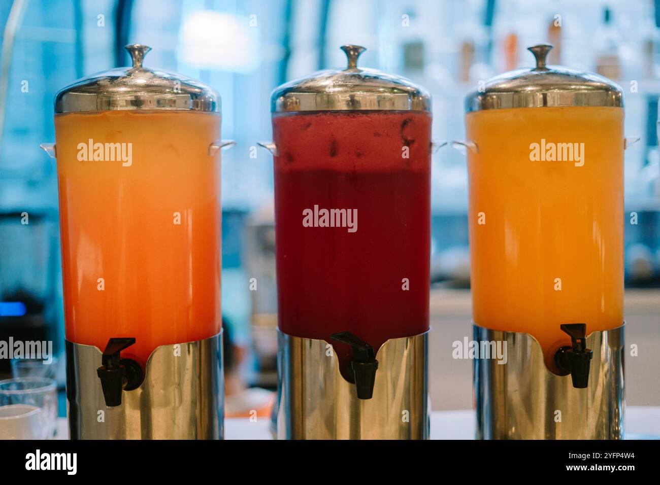 A luxurious hotel pitcher filled with refreshing syrup, elegantly ...
