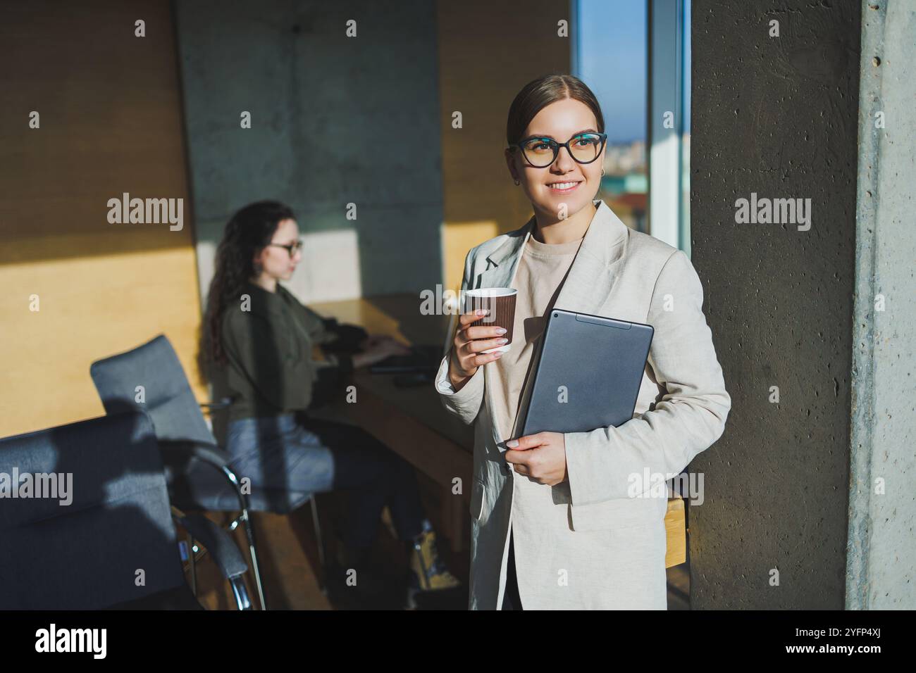 Office work, attractive young female manager working in office ...