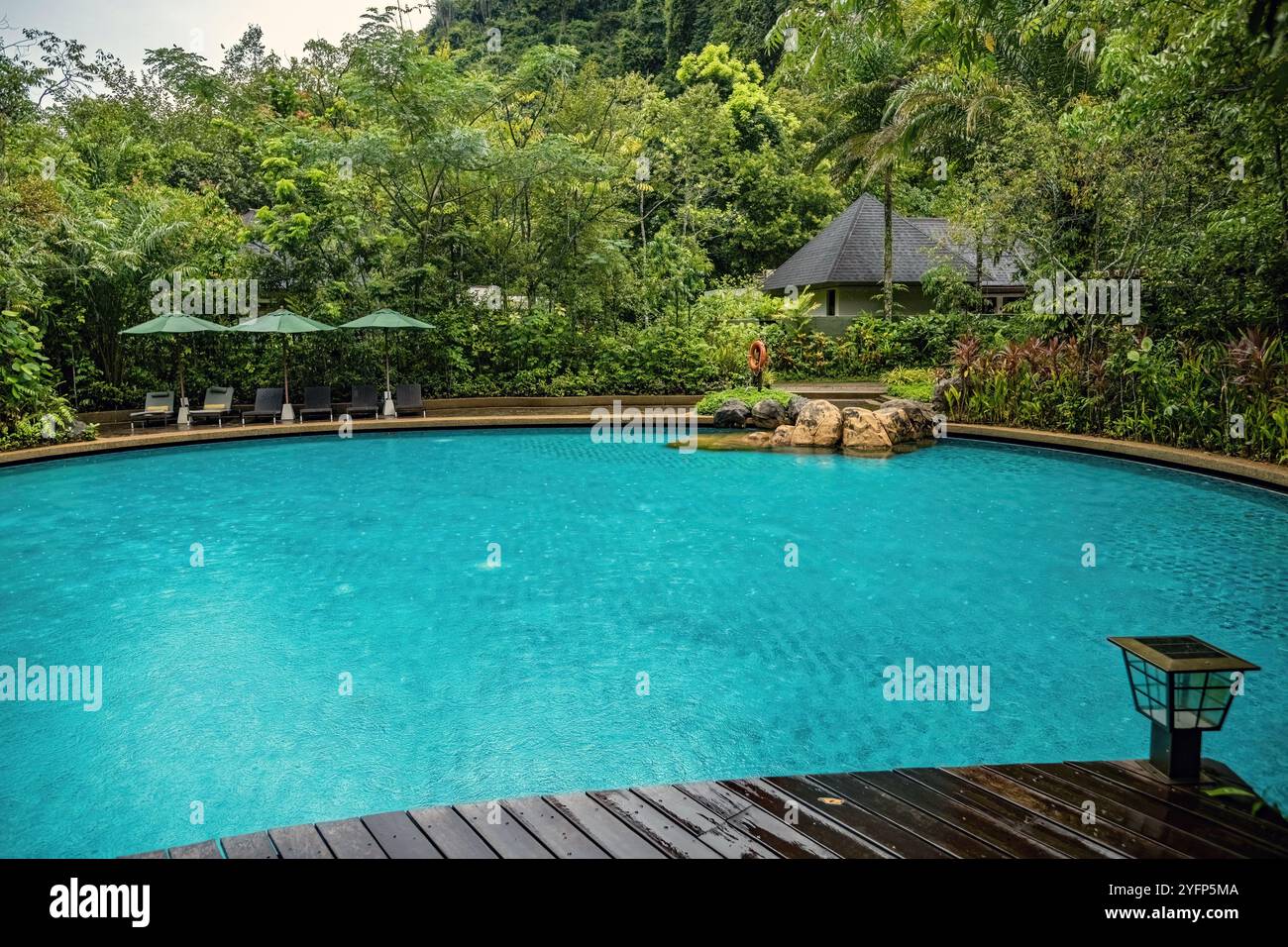 Peaceful sunny swimming pool area hi-res stock photography and images ...