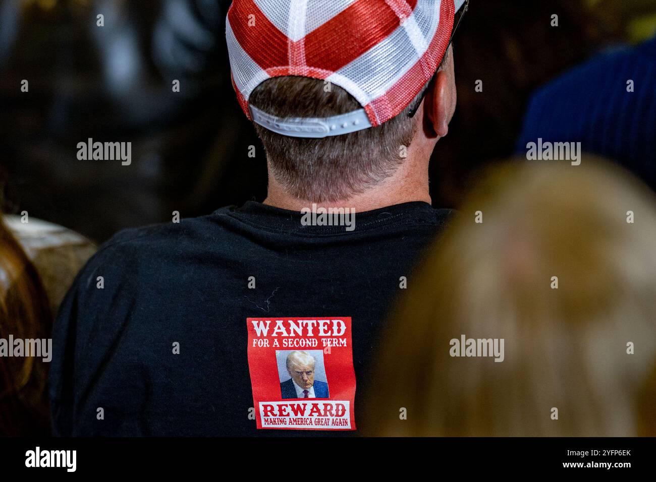 Atlanta, Georgia, USA. 04th Nov, 2024. An audience member in a Trump T ...