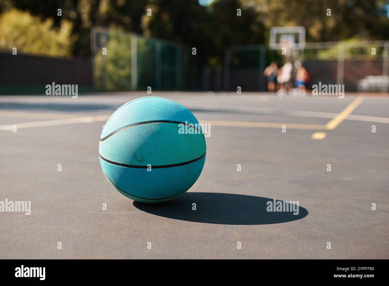 Ground, basketball court and ball with nature, training and sunshine ...
