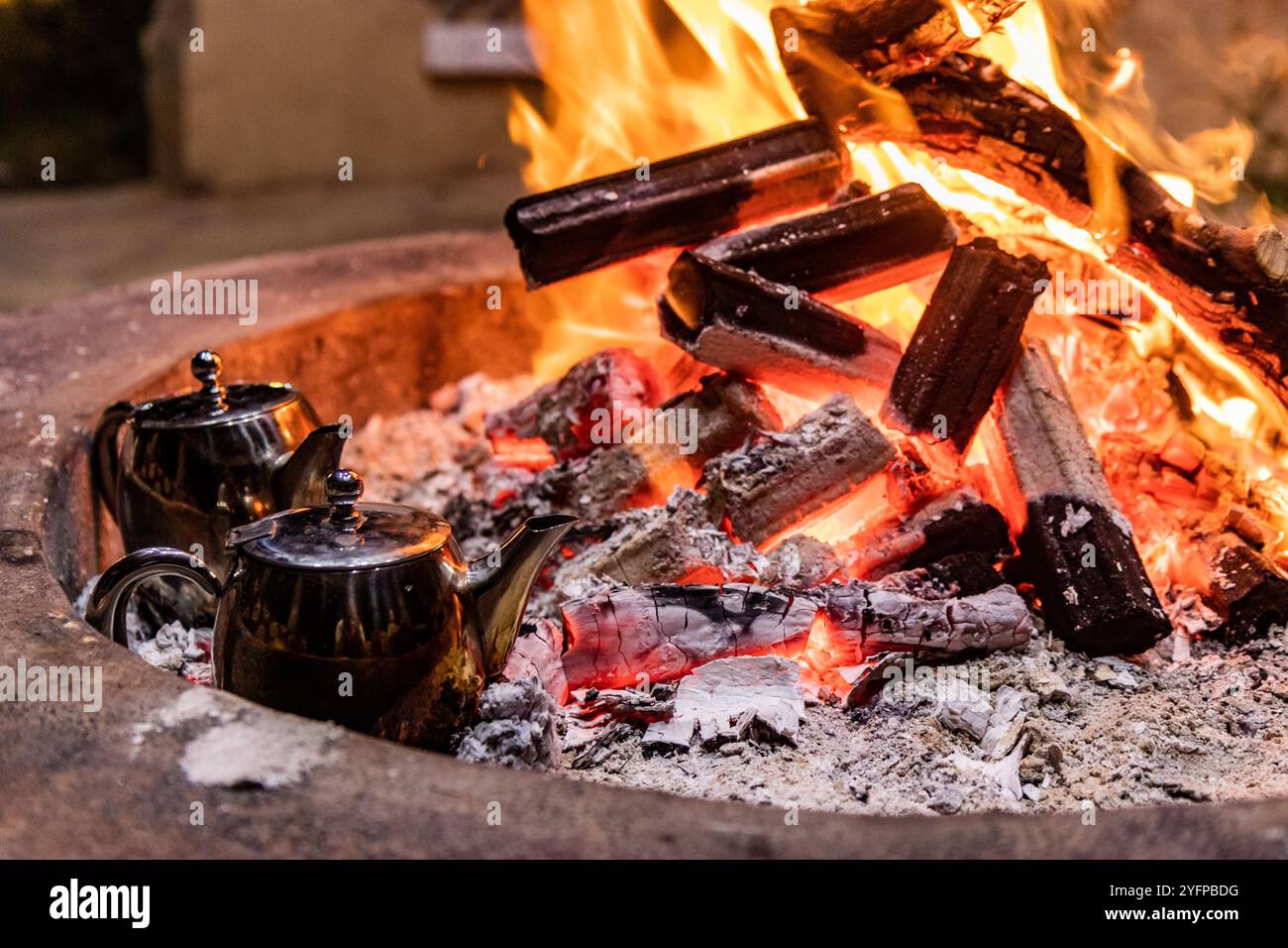 Pot tea on fireplace hi-res stock photography and images - Alamy