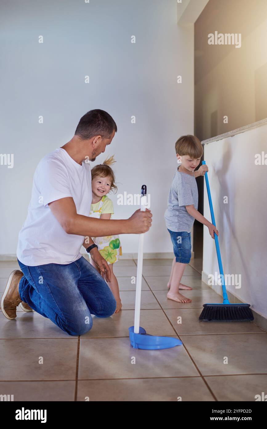 Cleaning, dad and children with broom, home and sweeping for hygiene ...