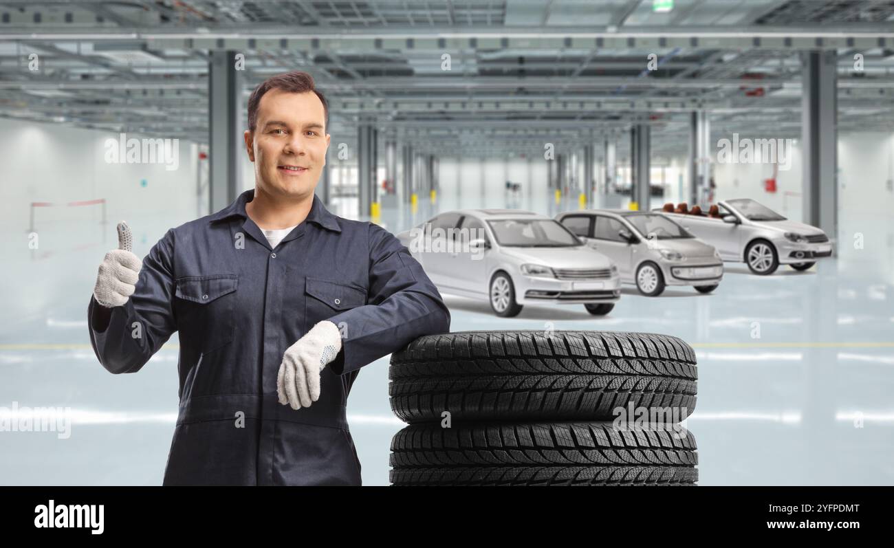 Man in overall standing garage hi-res stock photography and images - Alamy