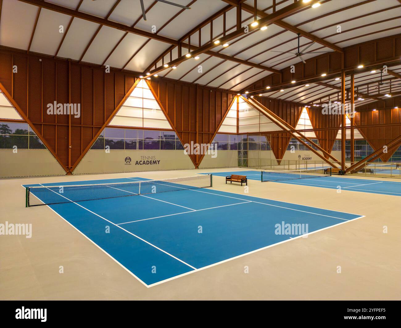 Bangkok, Thailand - October 30, 2024: Indoor covered tennis court at ...