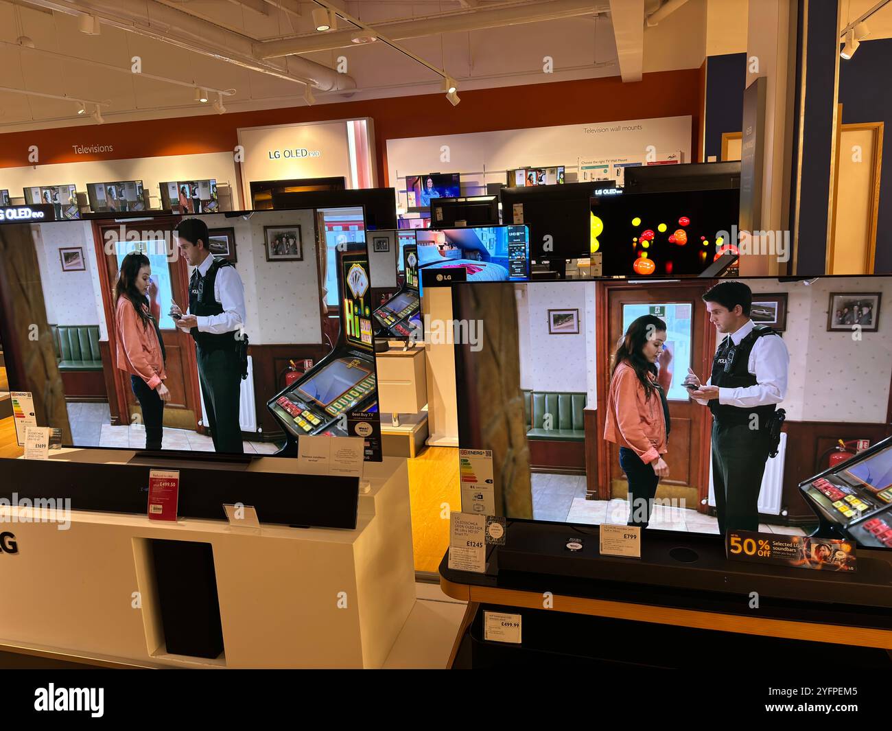 Display of television sets TVs inside John Lewis shop, Ipswich, England ...