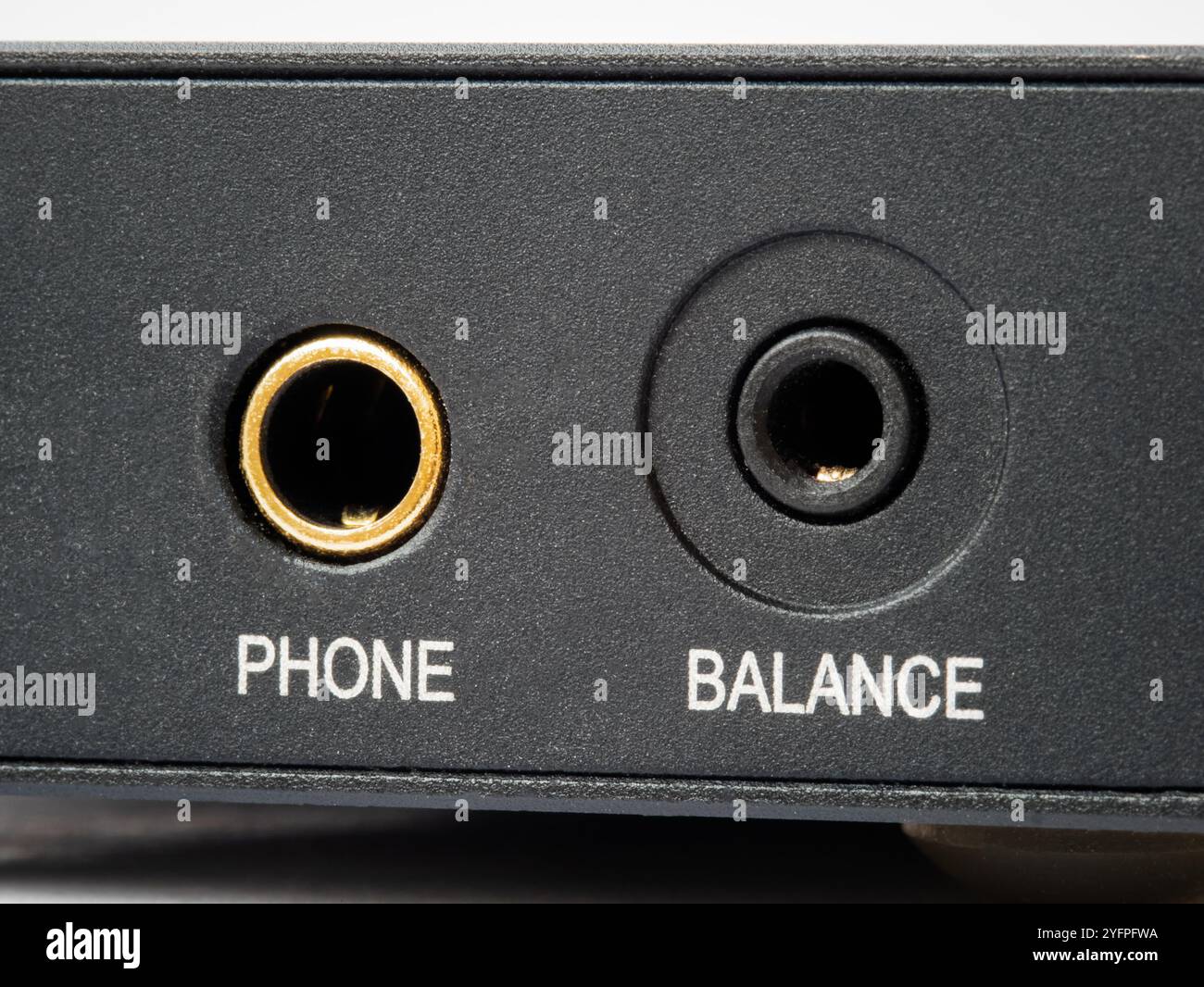 Close-up of the side wall of the audio player with gold-plated ...