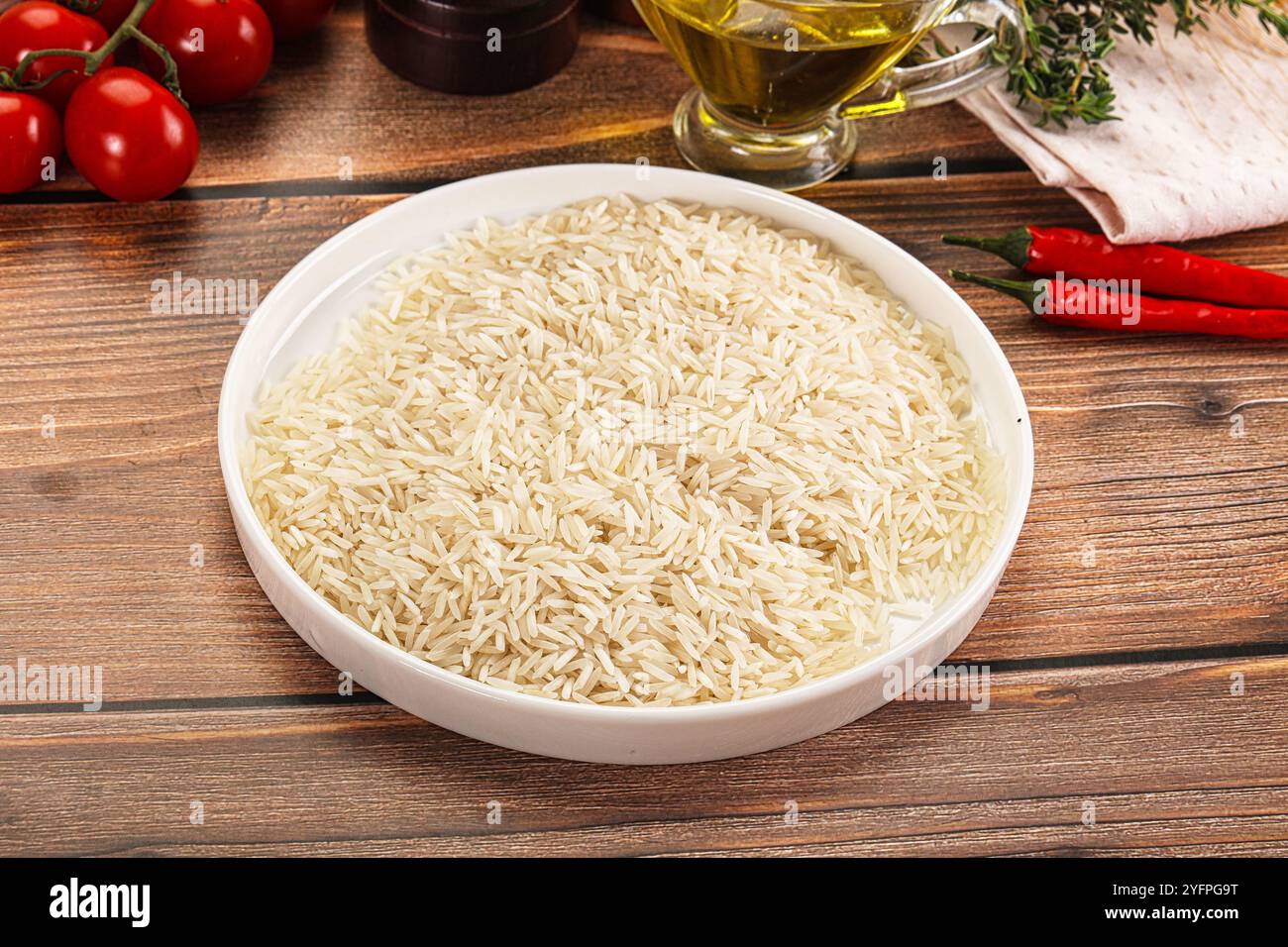 Indian cuisine - raw basmati rice for steam Stock Photo - Alamy