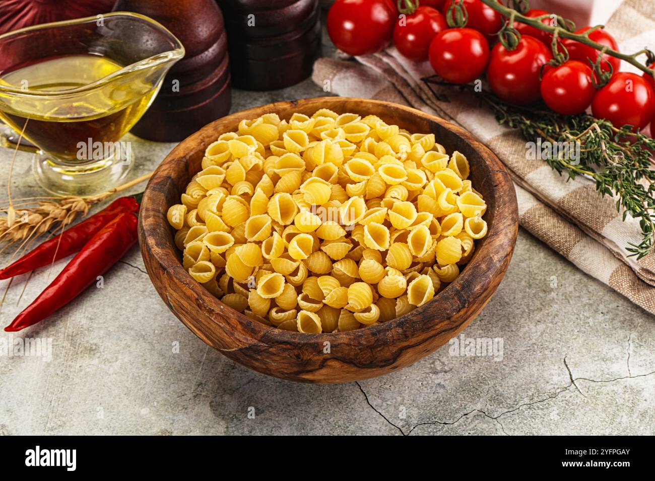 Italian cuisine - dry conchiglie shell pasta Stock Photo - Alamy