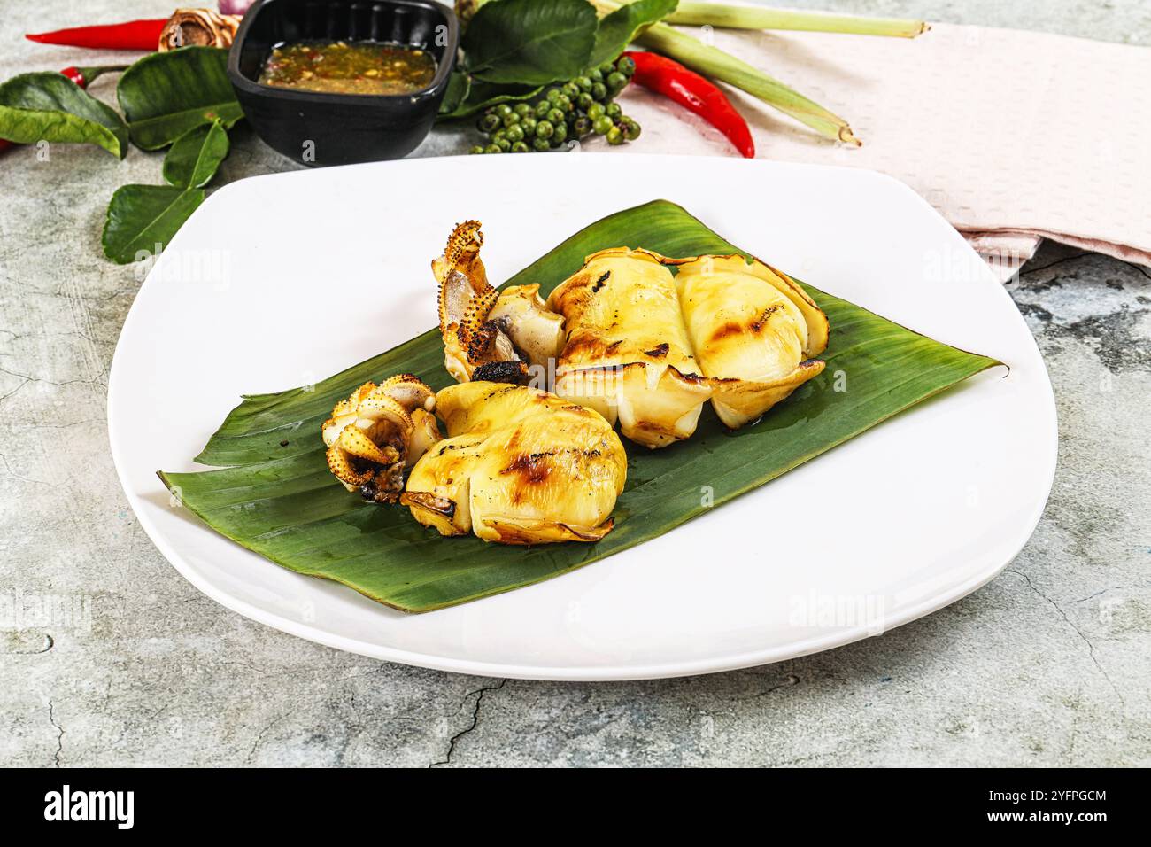 Delicous Grilled cuttlefish with sauce asian style Stock Photo - Alamy