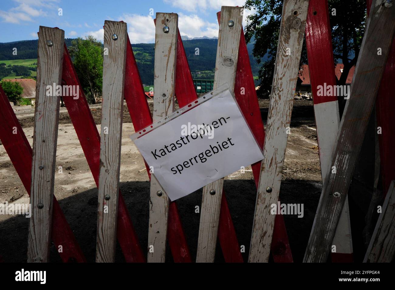 a storm damage warning sign, road sign on the street a storm damage ...