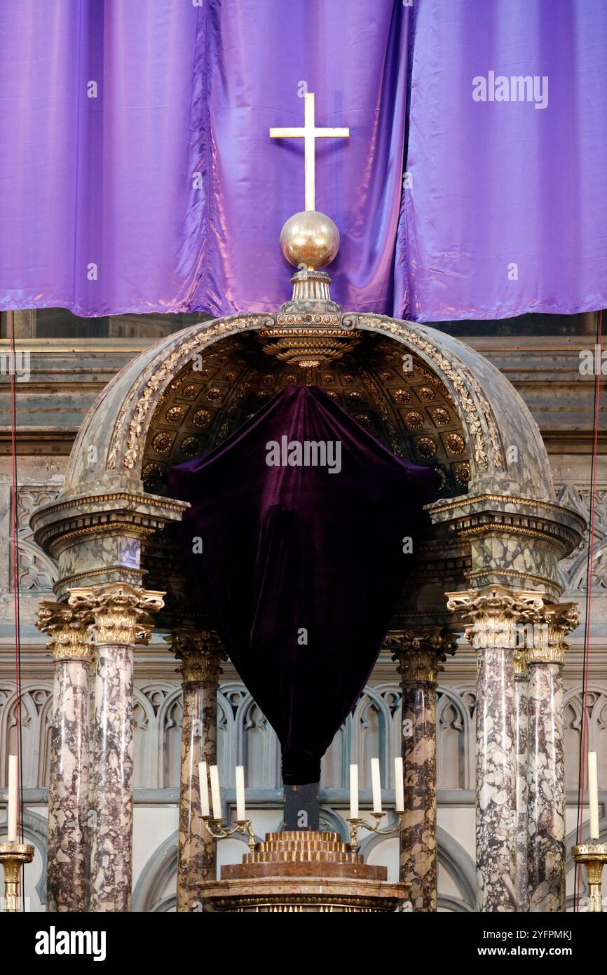Lent and Holy Week. Sacred image covered with purple fabric. Religious ...