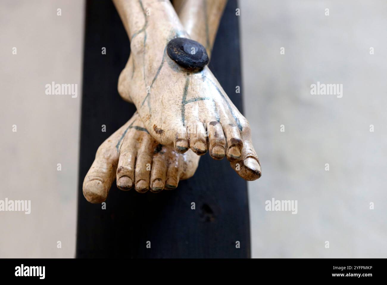 Church of Saint Michael. Jesus on the cross. The crucifixion. Close up on feet. Vienna. Austria ...